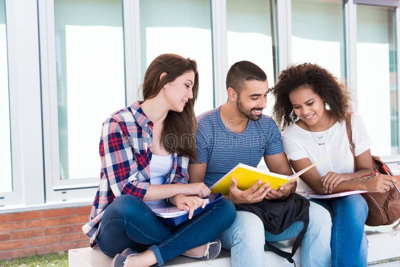 Students sharing notes stock image. Image of grade, people - 56739049