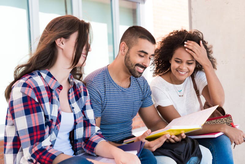 Students sharing notes stock image. Image of grade, people - 56739049