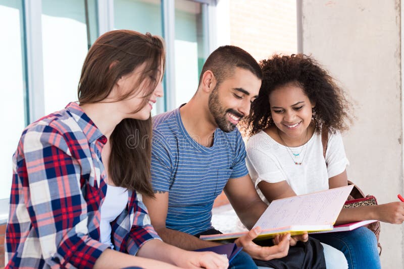 Students sharing notes stock image. Image of grade, people - 56739049