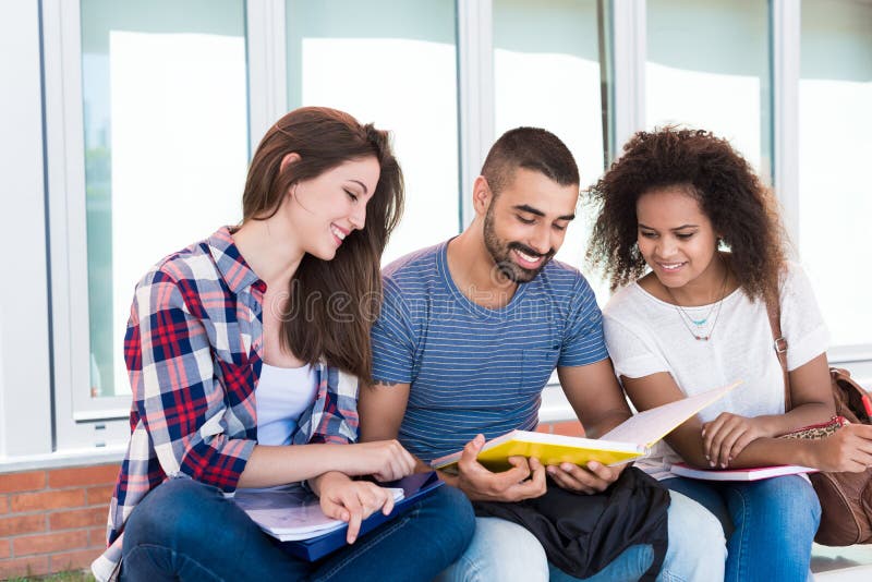Students sharing notes stock image. Image of grade, people - 56739049