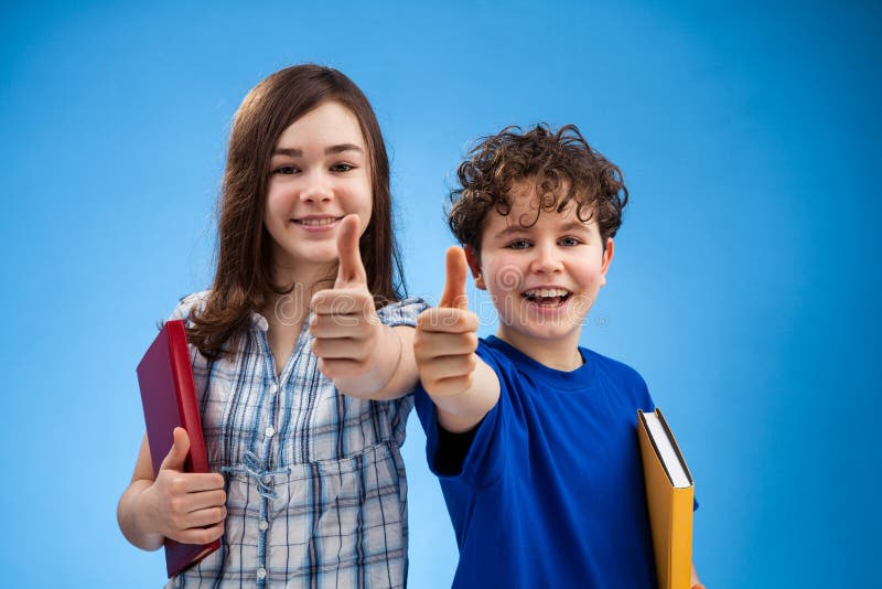 Students showing thumbs-up stock image. Image of sign - 34935233