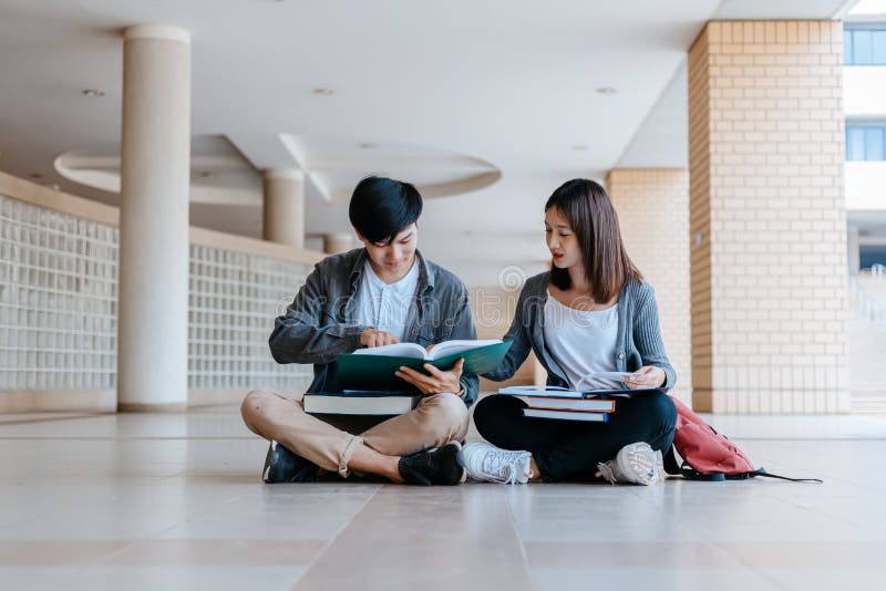 Students Sit and Read Books on the Campus. Eduaction Concept Stock ...