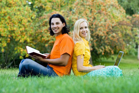 Students Sitting Back To Back Stock Image - Image of relaxation ...