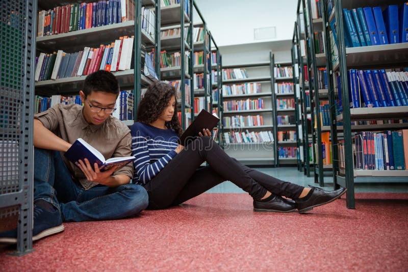 Students Sitting on the Floor and Reading Books Stock Photo - Image of ...