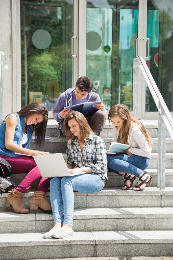 Students Sitting on Steps Studying Stock Photo - Image of casual ...