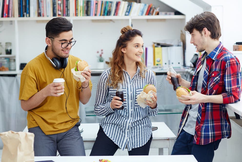 Students with snack stock image. Image of eating, snack - 94122571