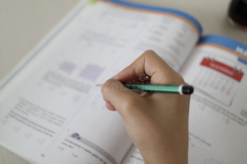 Students Solve with Pencil Tests on the Test Booklet Stock Photo ...