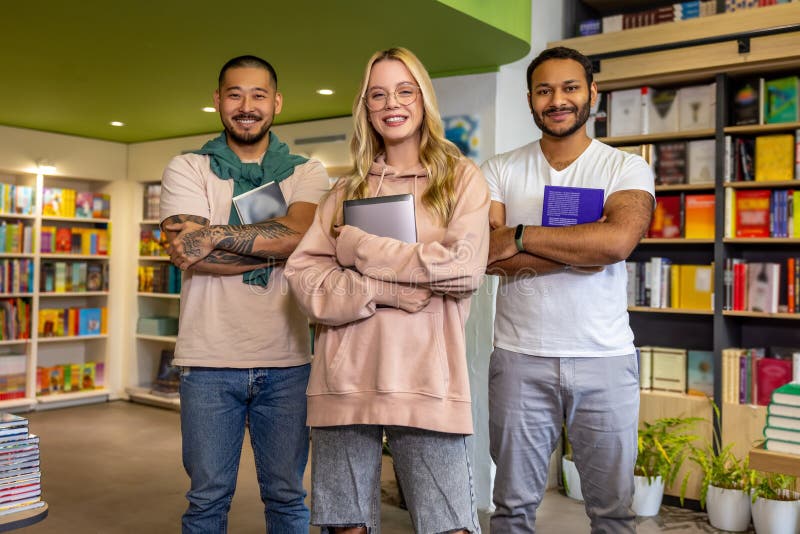 Students Standing with Books in Library Stock Image - Image of student ...