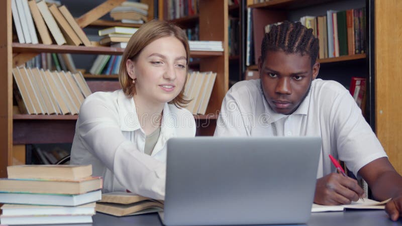 4K. Students Study Together in the Library. Students Prepare for Exams ...