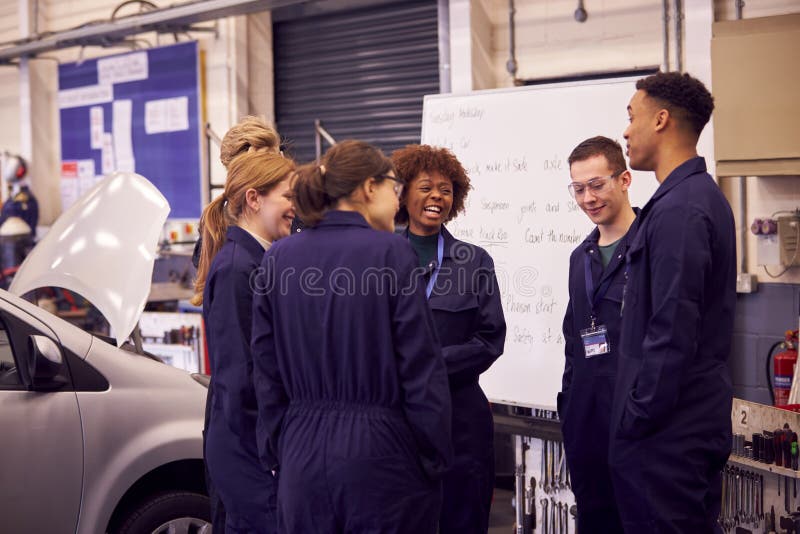 Students Studying for Auto Mechanic Apprenticeship at College Standing ...