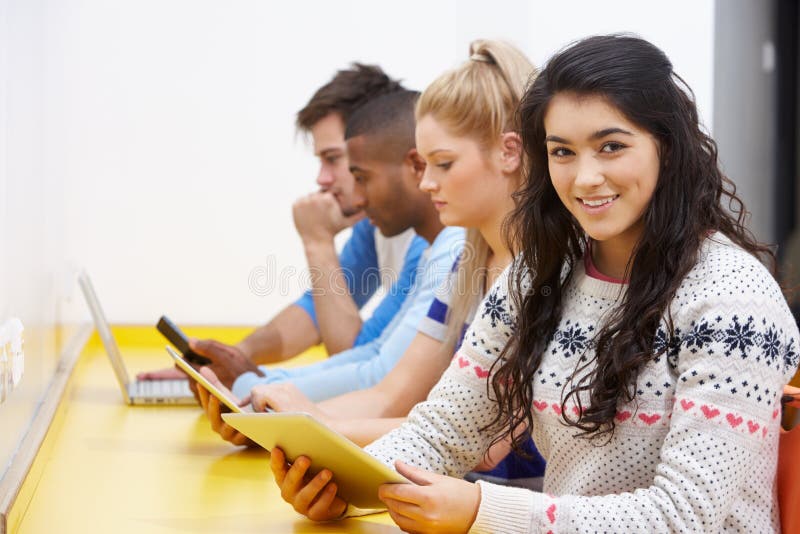 Students Studying in Classroom with Digital Devices Stock Photo - Image ...