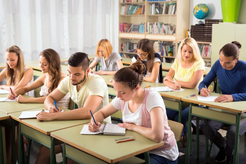 Students Studying in Classroom Stock Photo - Image of room, desk: 55324738