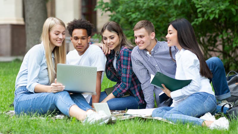 Students Studying in Group Project Outdoors in College Campus Stock ...