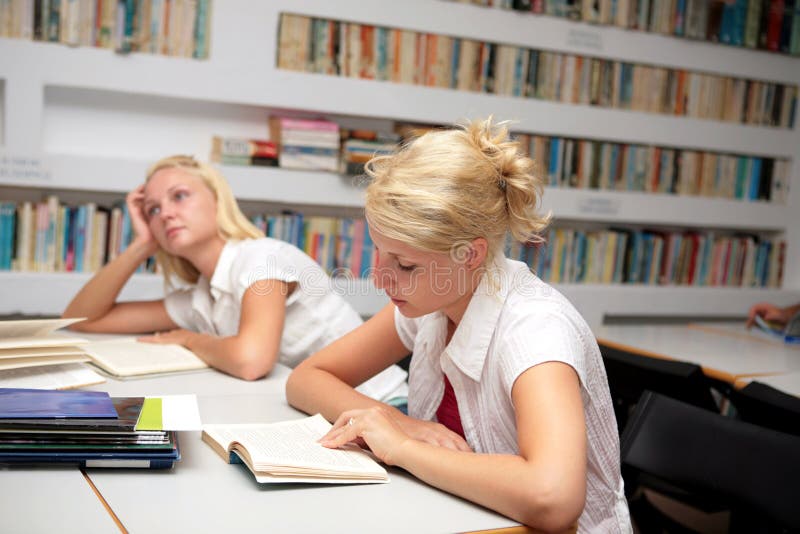 Students Studying in Library Stock Photo - Image of women, college ...