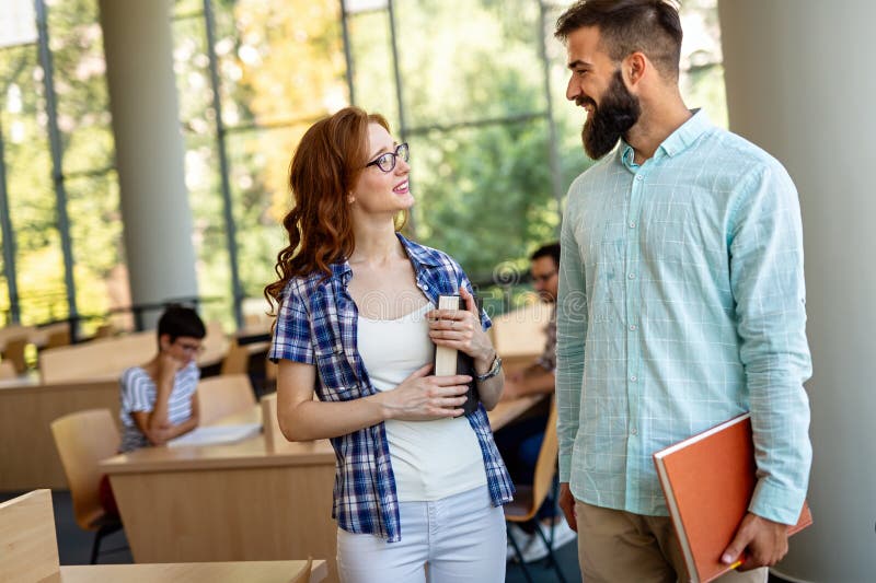 Students Studying in Library. Young Success People are Spending Time ...