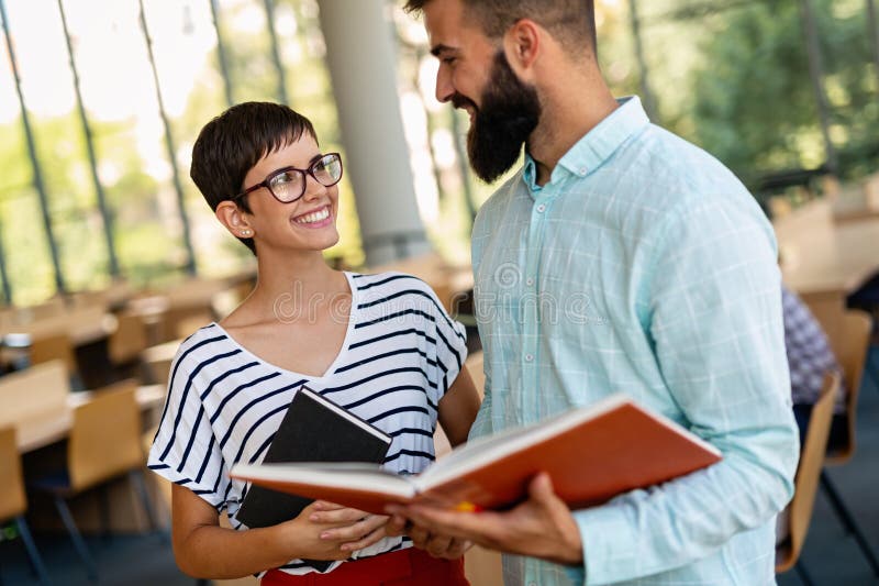 Students Studying in Library. Young Success People are Spending Time ...