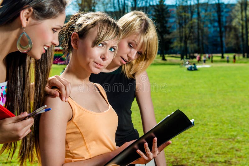 Students studying outdoors stock image. Image of friendship - 32680743