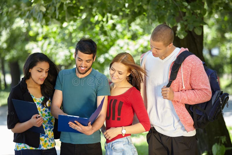 Students studying outside stock photo. Image of group - 57363830