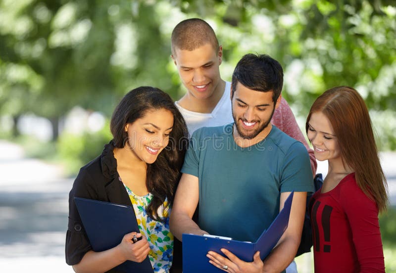 Students studying outside stock photo. Image of students - 57364604