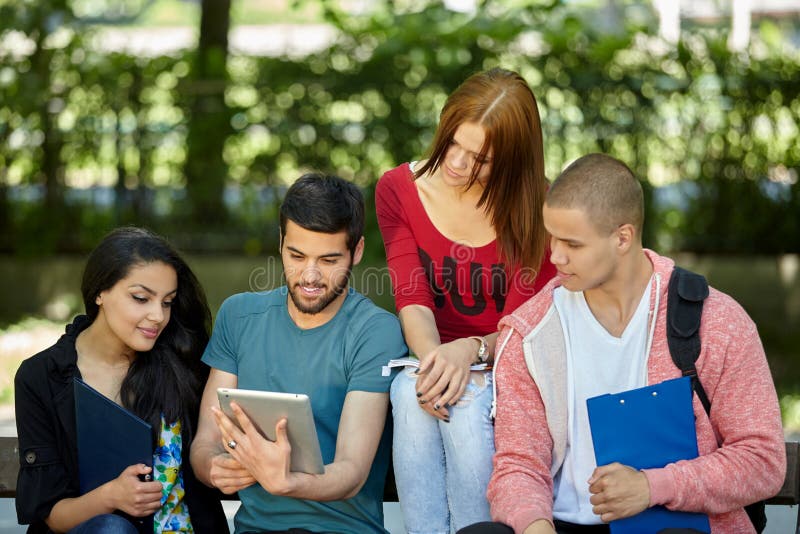 Students studying outside stock image. Image of causal - 57364979