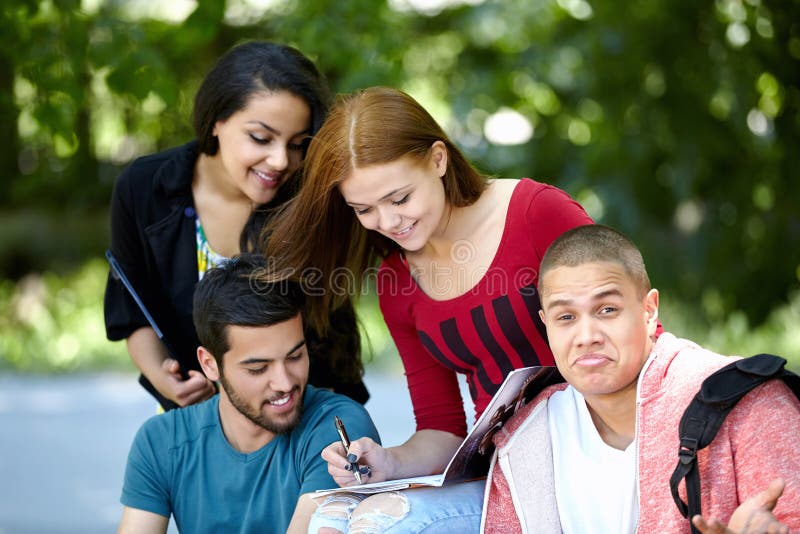 Students studying outside stock photo. Image of students - 57365574