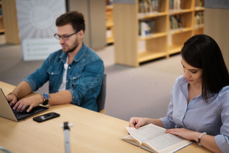 Multicultural Students Studying in a Public Library Stock Photo - Image ...