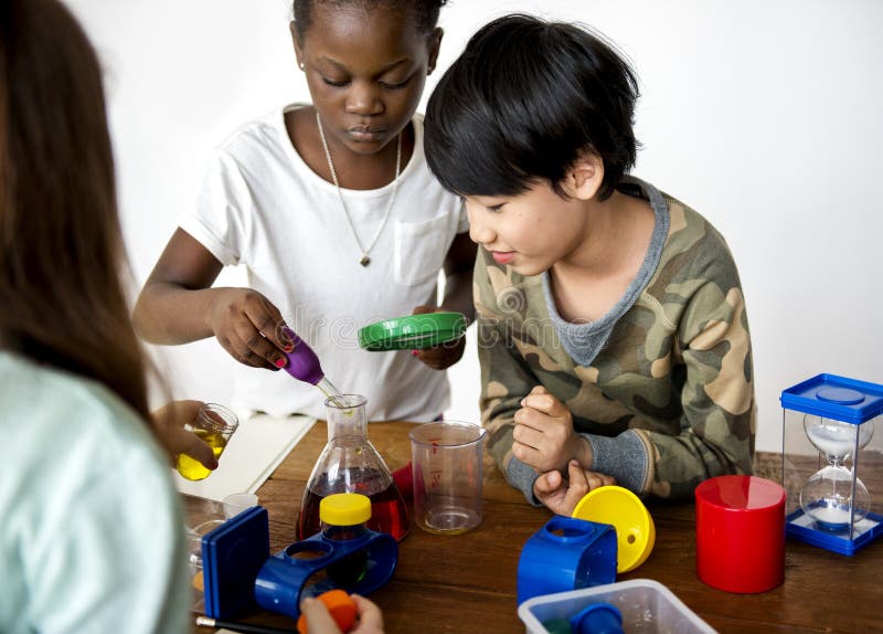 Students Conducting Scientific Experiment Concept Stock Photo - Image ...