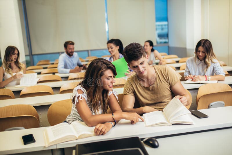 Students Sitting in a Classroom, Using Computers during Class Stock ...
