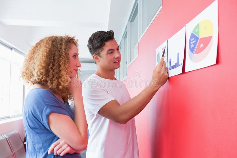 Students Studying Together with Graphics on the Wall Stock Image ...
