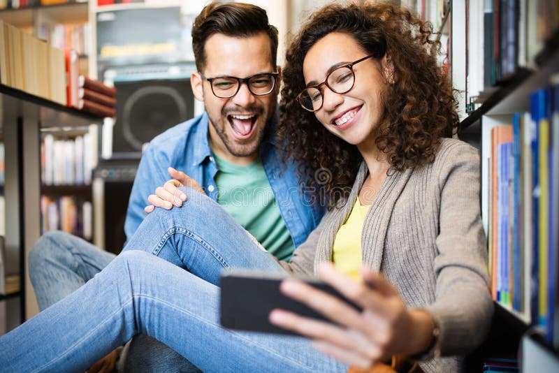 Students are Studying Together in Library. Couple, Study, Technology ...