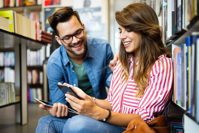 Students are Studying Together in Library. Couple, Study, Technology ...