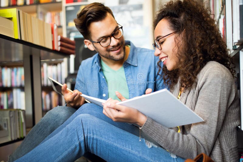 Students are Studying Together in Library. Couple, Study, Technology ...