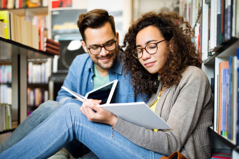 Students are Studying Together in Library. Couple, Study, Technology ...