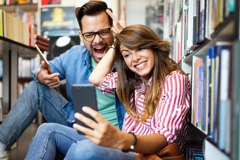 Students are Studying Together in Library. Couple, Study, Technology ...