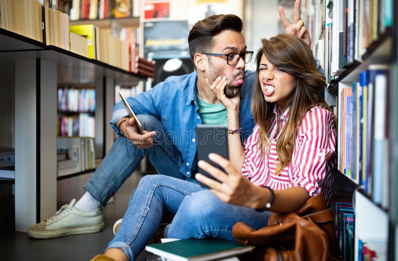 Students are Studying Together in Library. Couple, Study, Technology ...