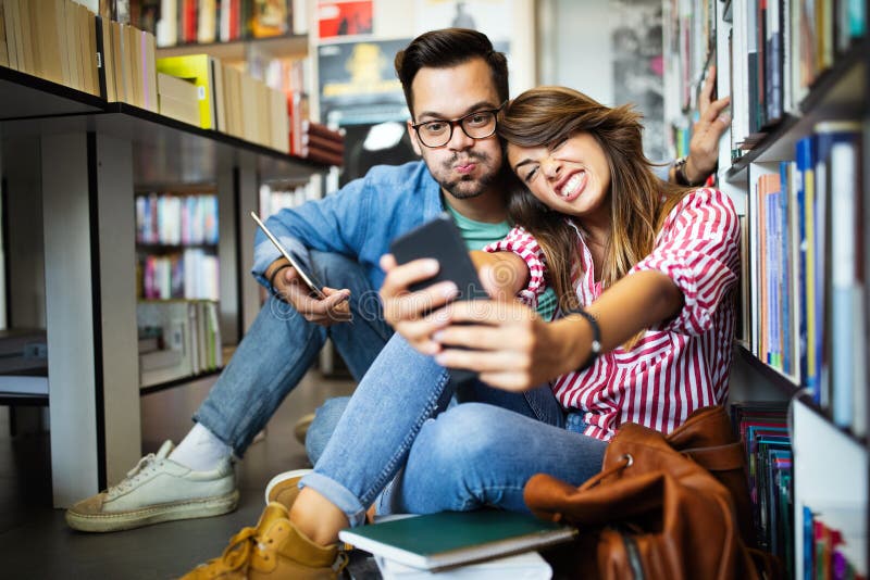 Students are Studying Together in Library. Couple, Study, Technology ...