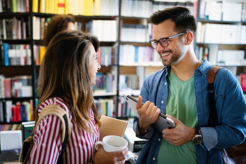 Students are Studying Together in Library. Couple, Study, Technology ...