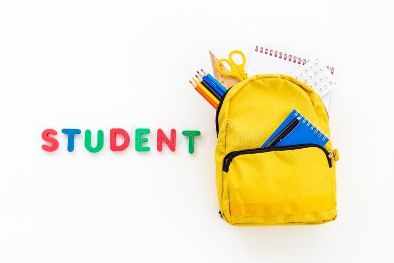 Students Supplies in Yellow School Backpack. Back To School Concept ...