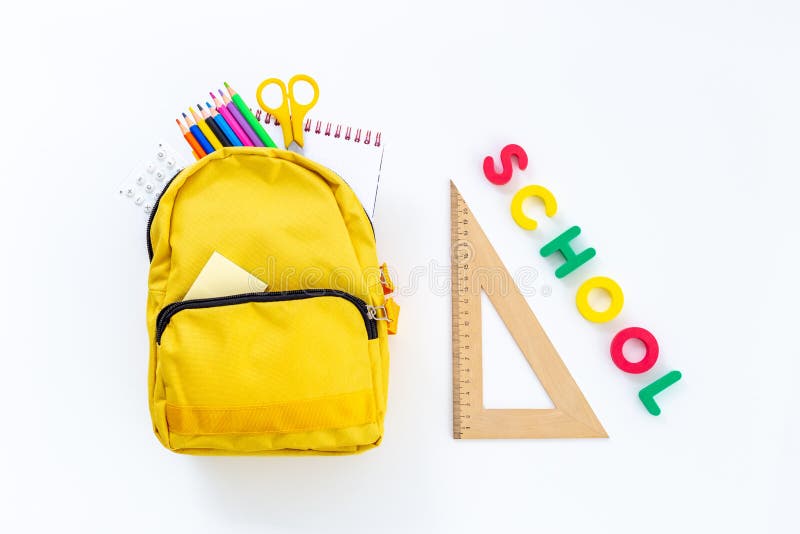 Students Supplies in Yellow School Backpack. Back To School Concept ...