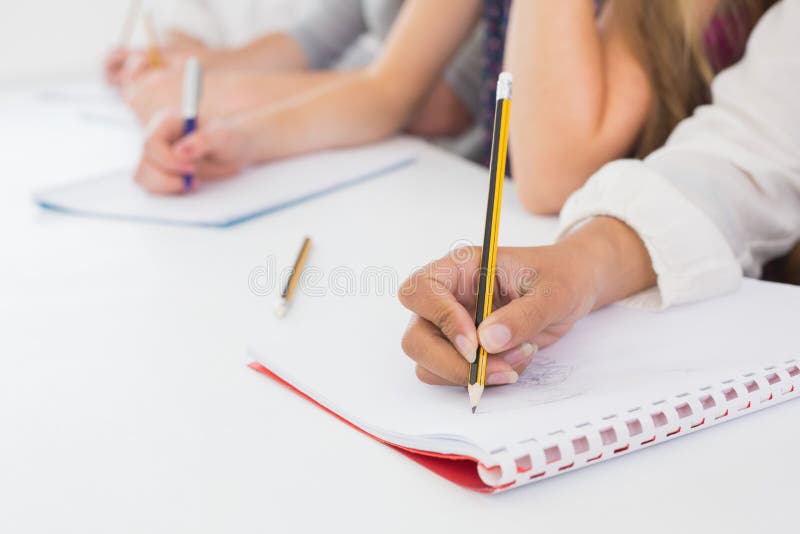 Students Taking Notes in Class Stock Photo - Image of school, adult ...