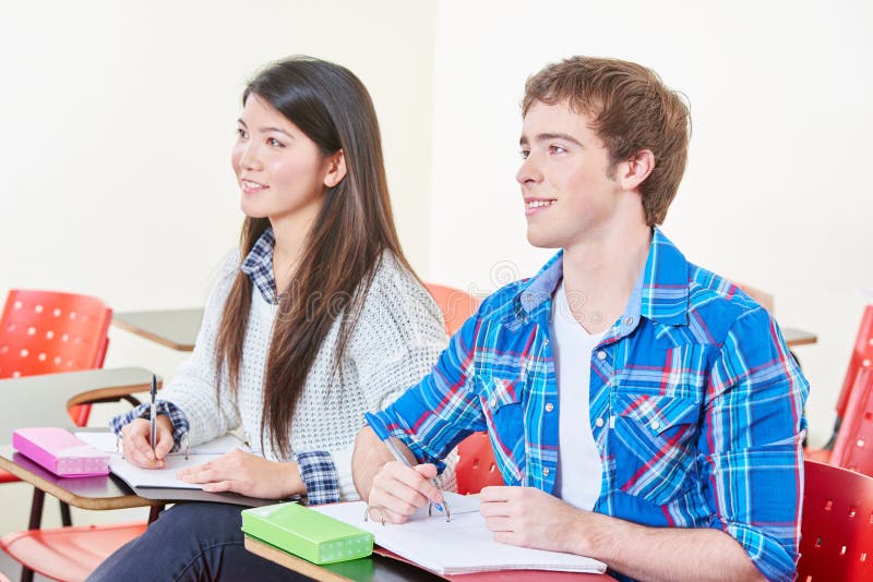 Students Taking Notes in Class Stock Photo - Image of people ...