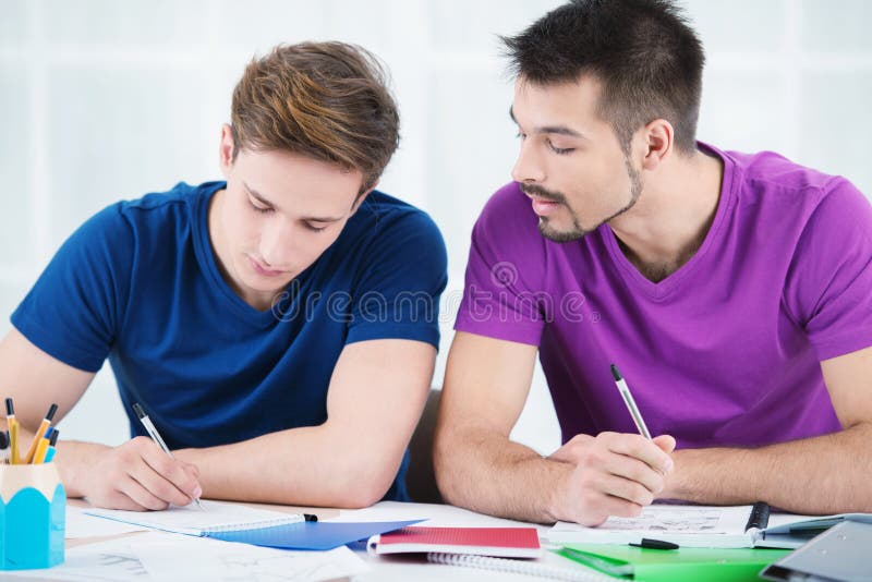 Students Taking Notes in Classroom Stock Image - Image of sitting ...