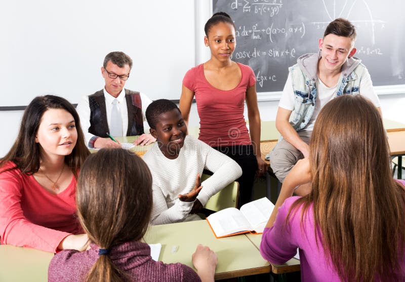 Junior School Students Working in a Library Stock Photo - Image of ...