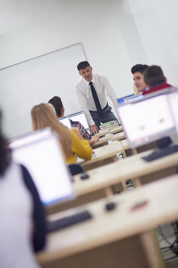 Students with Teacher in Computer Lab Classrom Stock Image - Image of ...