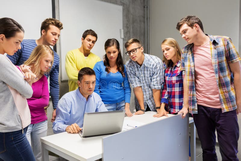 Students and Teacher with Laptop at School Stock Photo - Image of group ...