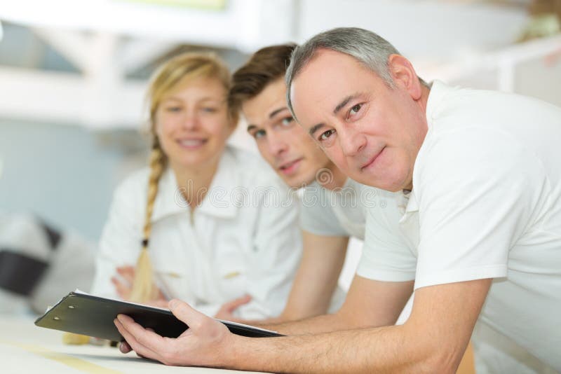 Students and Teacher Looking at Camera Stock Image - Image of ...