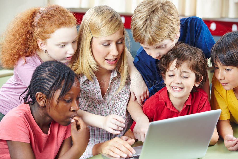 Students and Teacher Using Internet Stock Image - Image of primary ...
