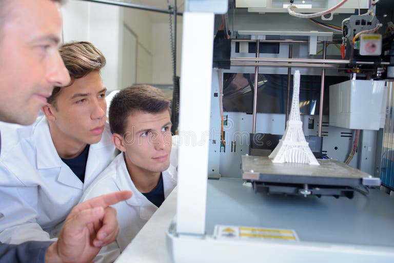 Students and Teacher Watching Experiment with Model Eiffel Tower Stock Image - Image of positive ...