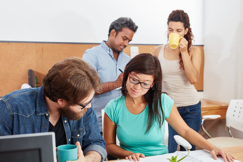 Students in Teamwork at University Stock Image - Image of office ...