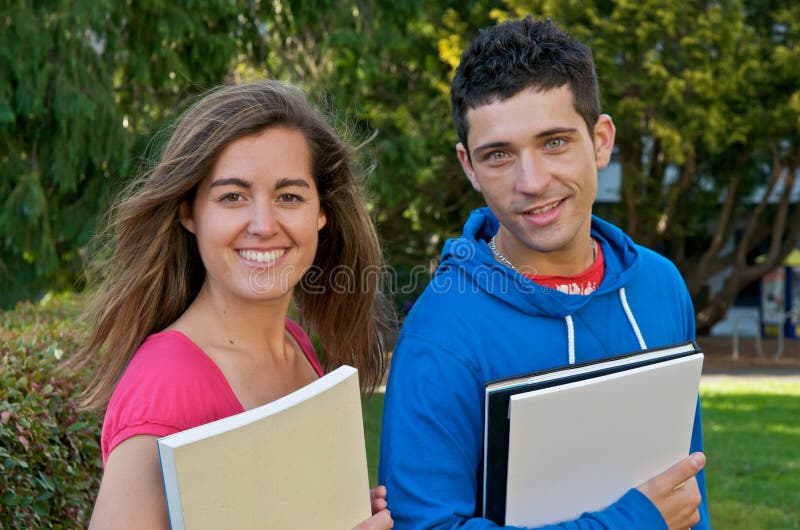 Student with Textbook in Classroom Stock Photo - Image of book ...